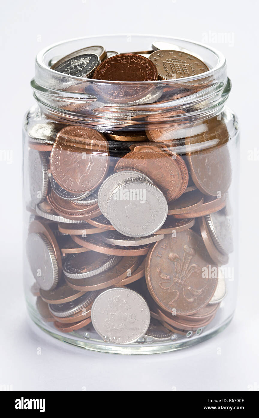 Jar of coins Stock Photo - Alamy