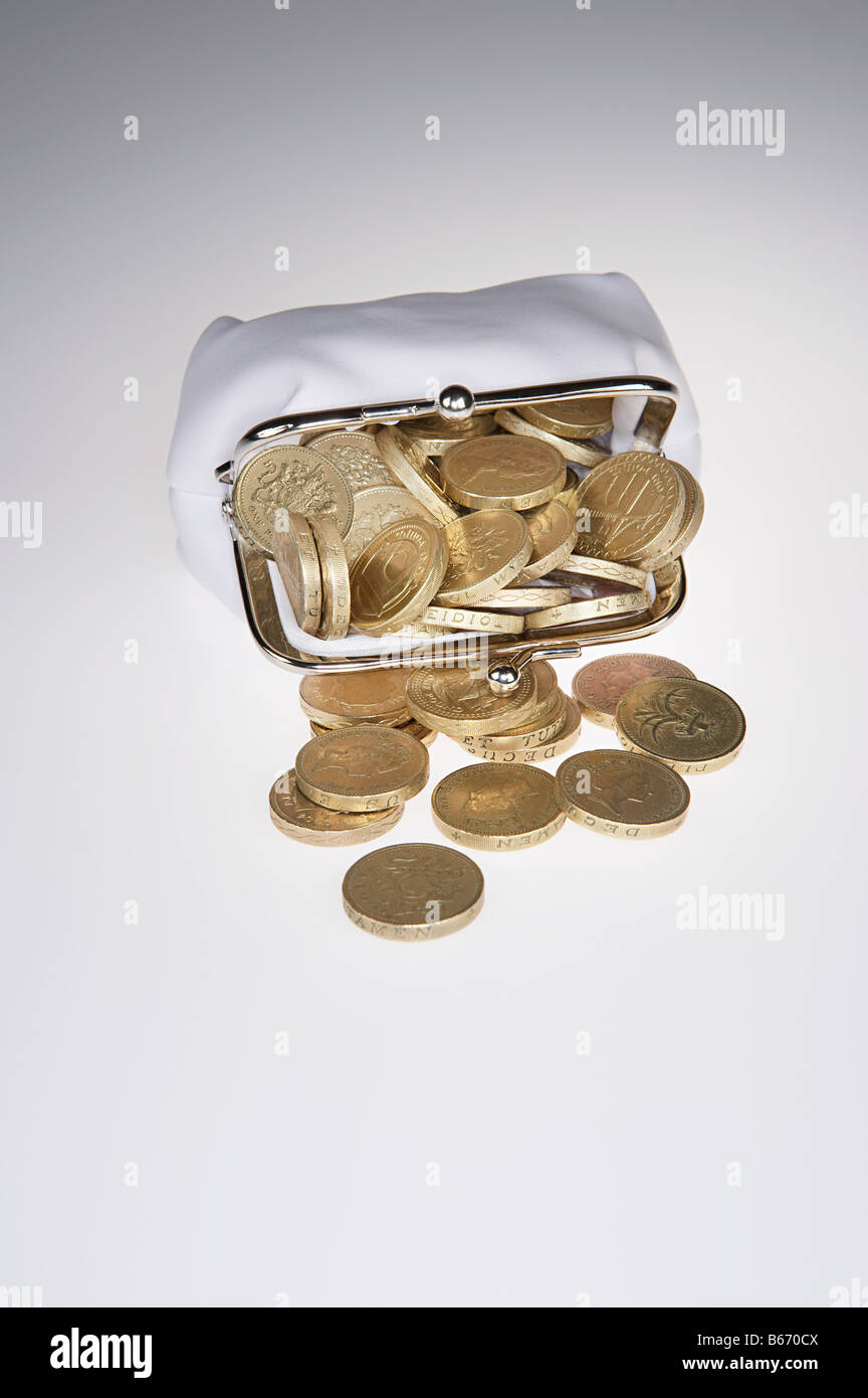 Full purse pound coins hi-res stock photography and images - Alamy