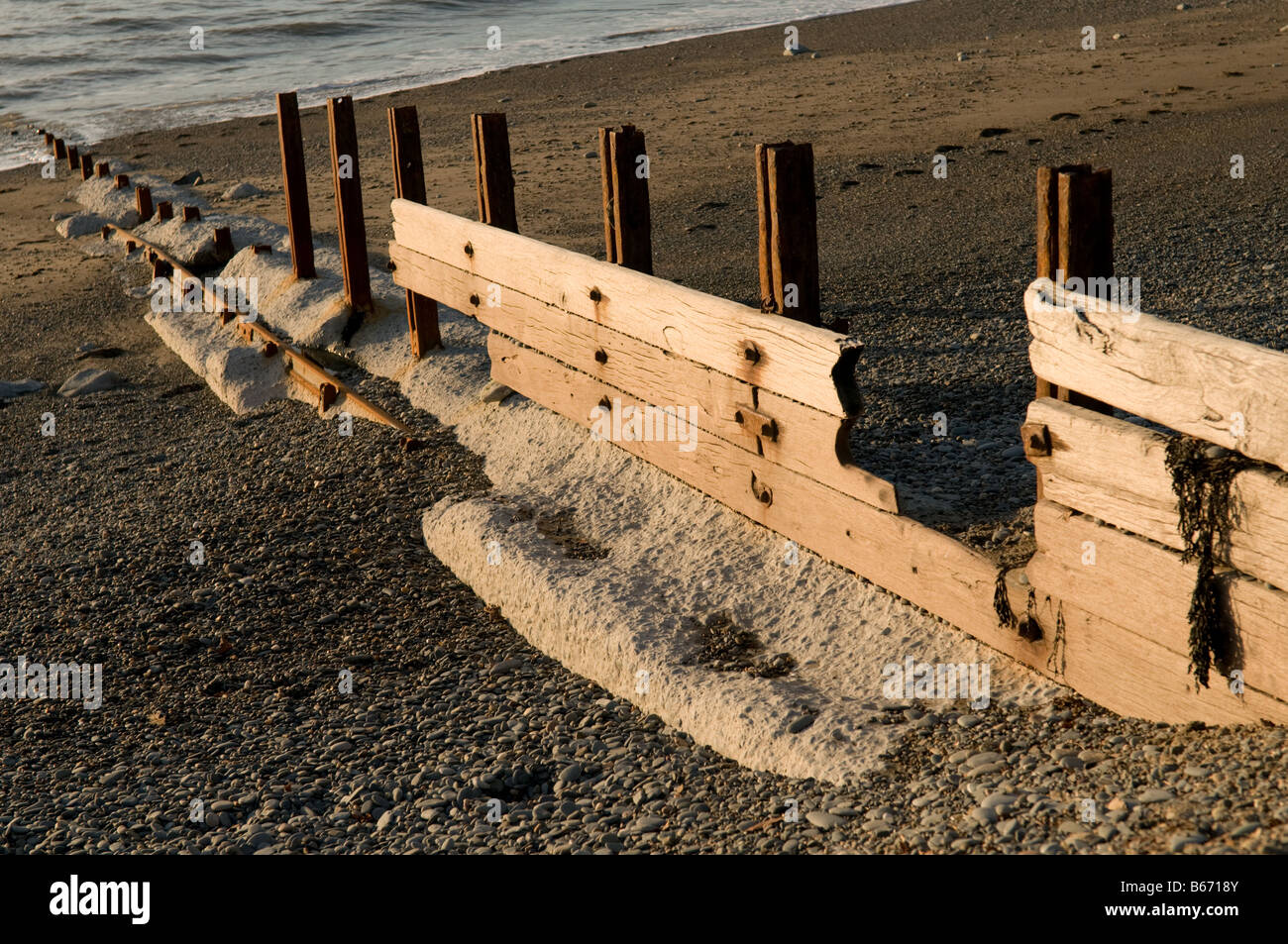 heavily eroded and storm damaged concrete groyne sea defences on ...