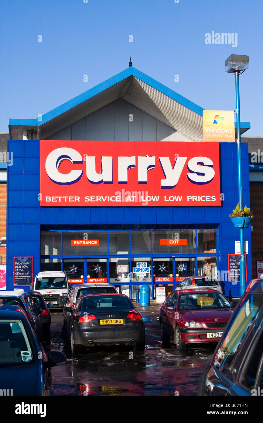 Currys retail store on out of town shopping park sign showing signs of ...