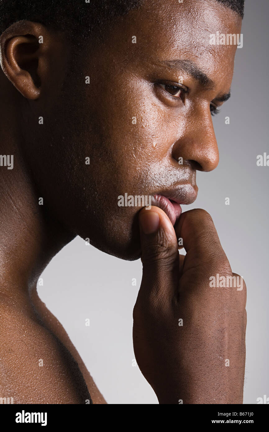 Portrait of a man thinking Stock Photo - Alamy
