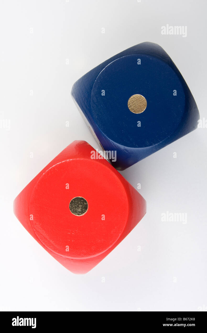 Red and white dice on white background from above showing double one ...