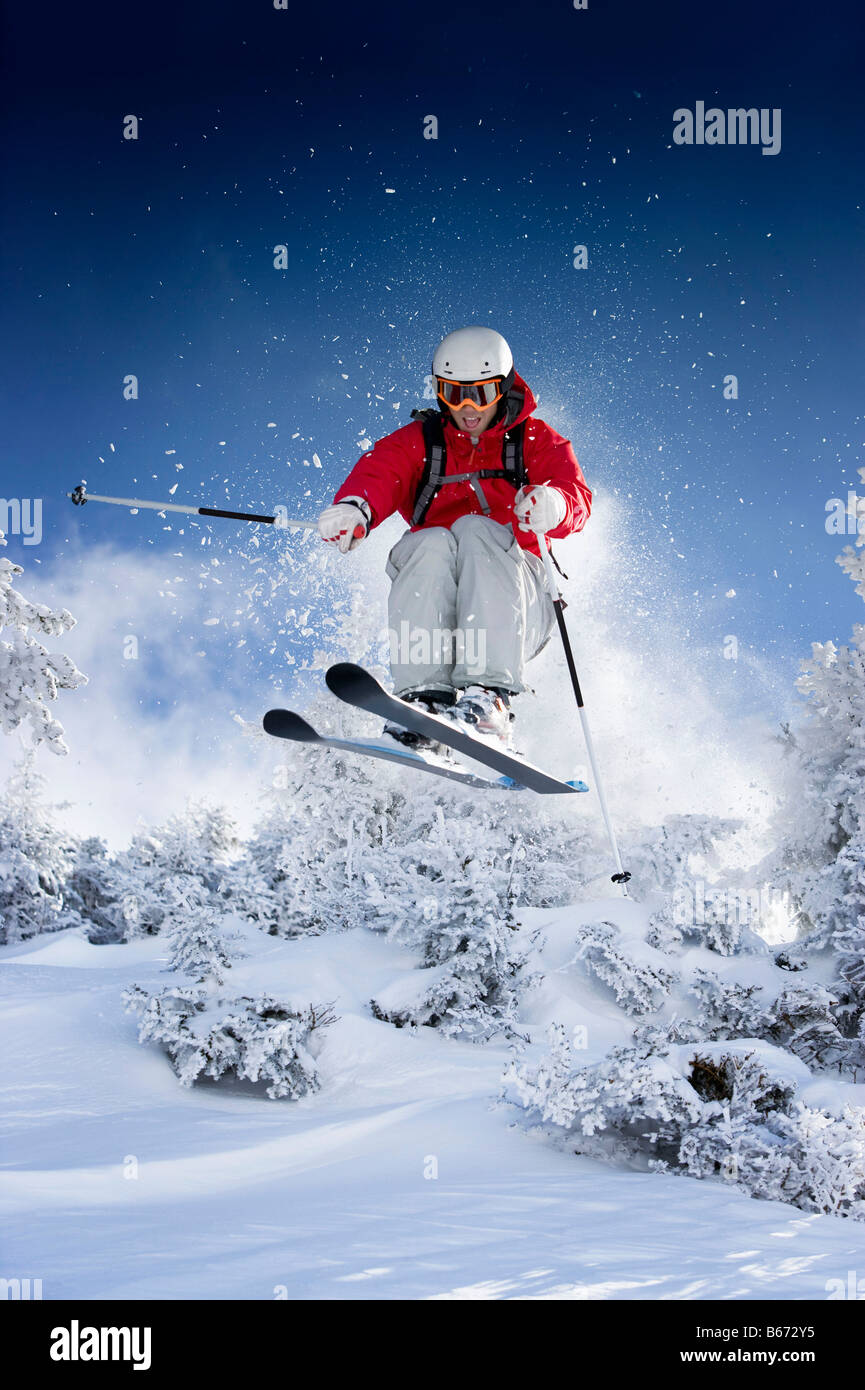 Skier jumping towards camera Stock Photo - Alamy