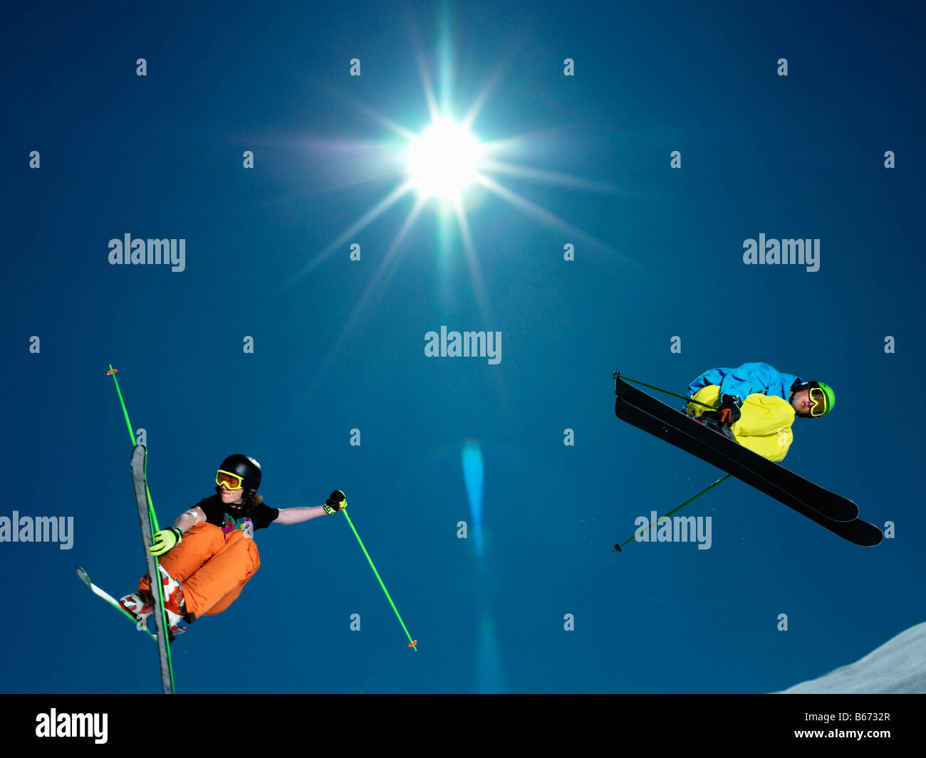 Two skiers jumping hi-res stock photography and images - Alamy