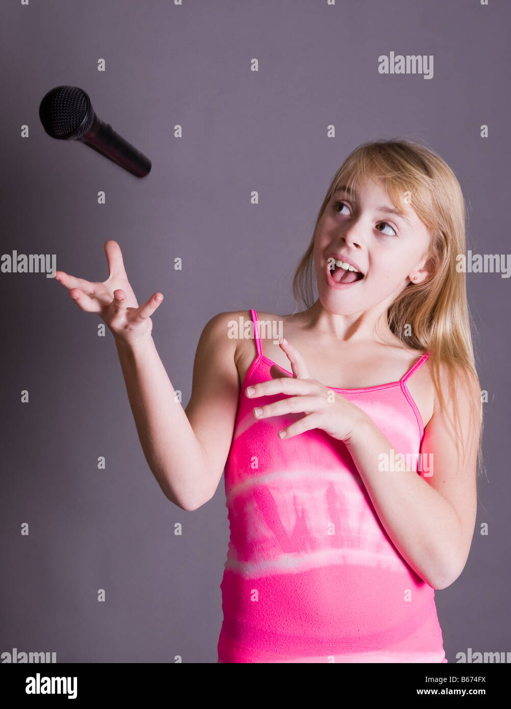 Child with microphone hi-res stock photography and images - Alamy