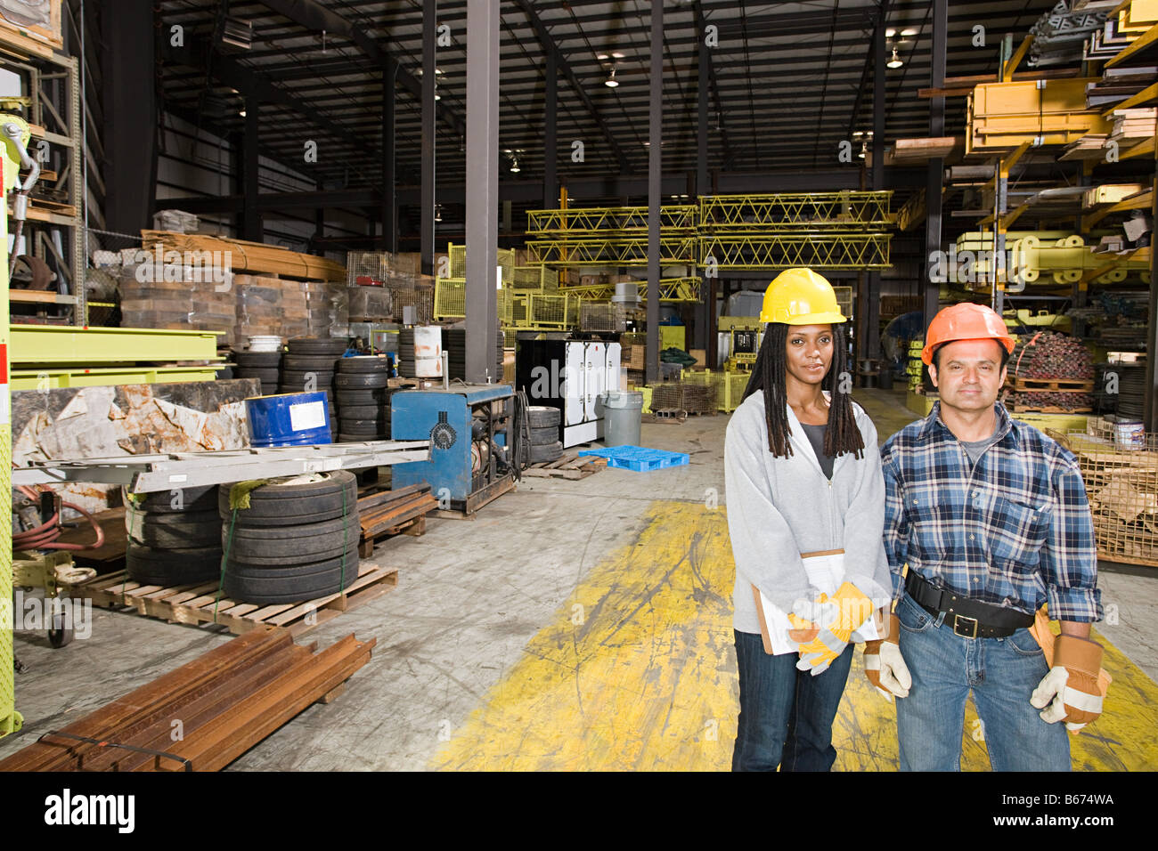 Colleagues in warehouse Stock Photo - Alamy