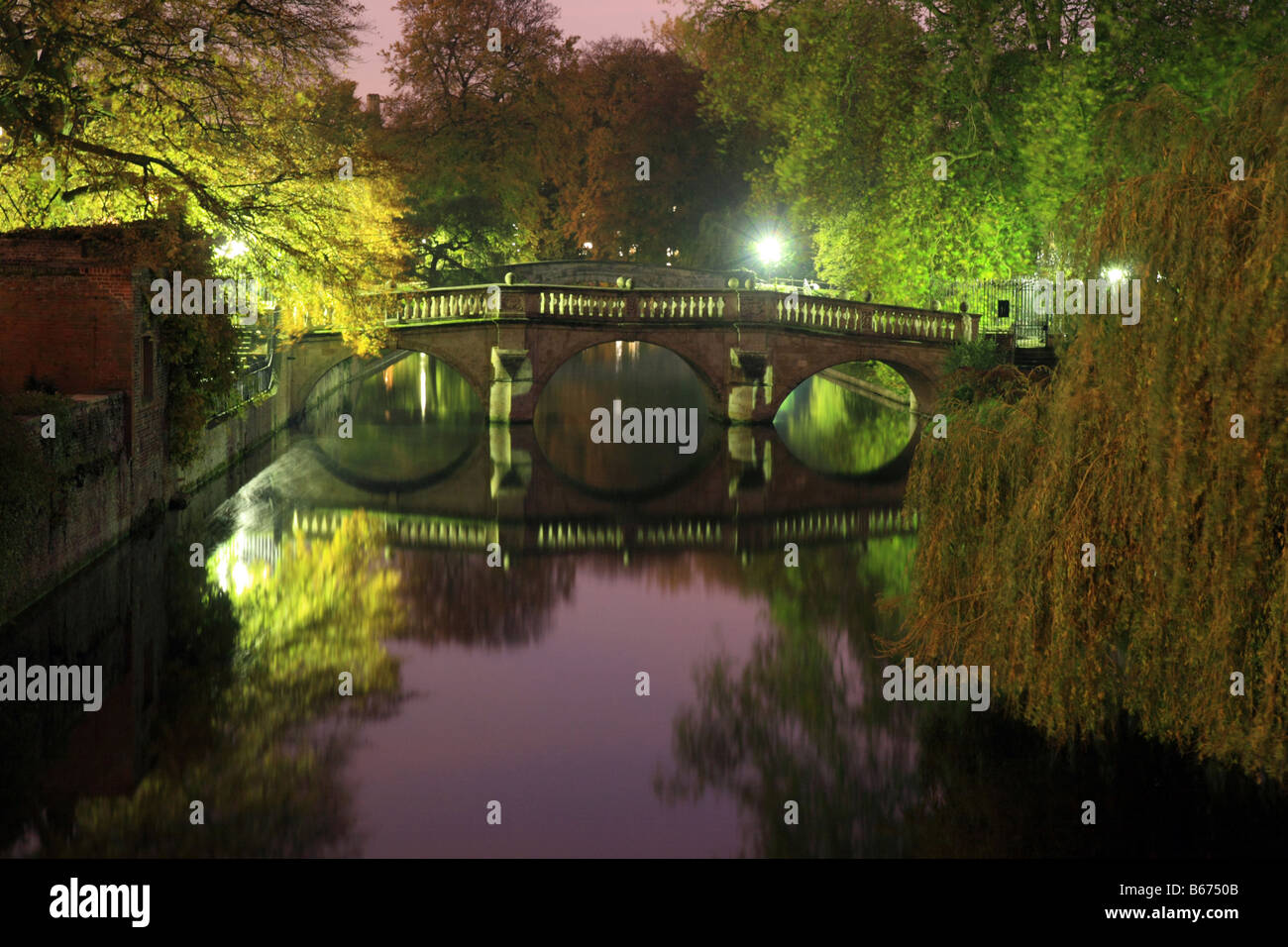"Clare college bridge at night", and the reflections in the river Cam ...