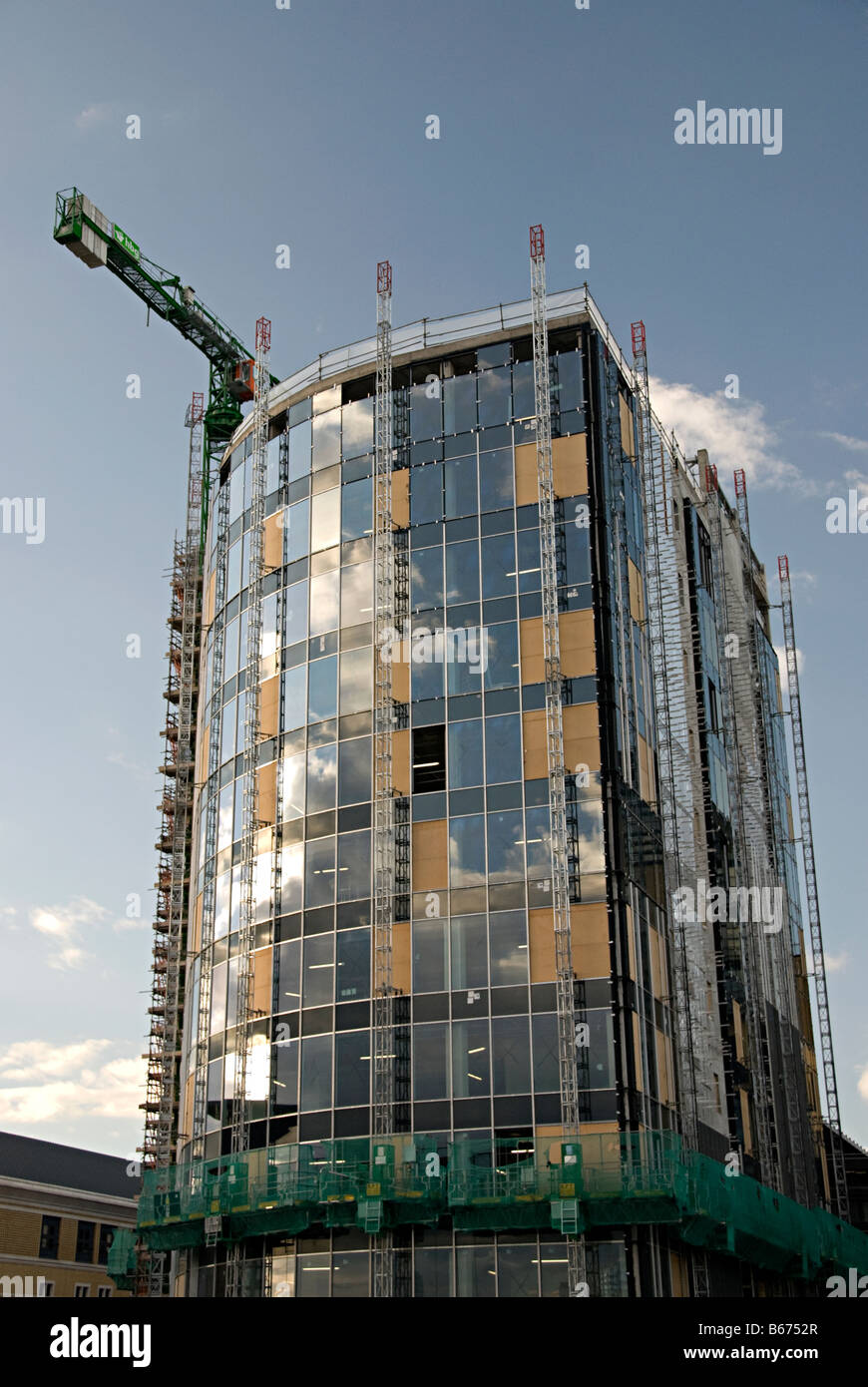 number nine brindley place the building of with a crane and glass ...
