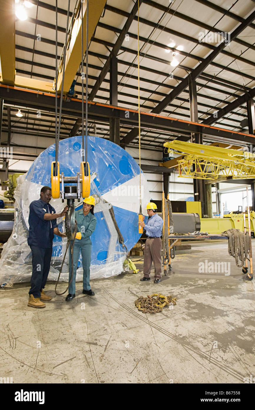 Workers in warehouse Stock Photo - Alamy