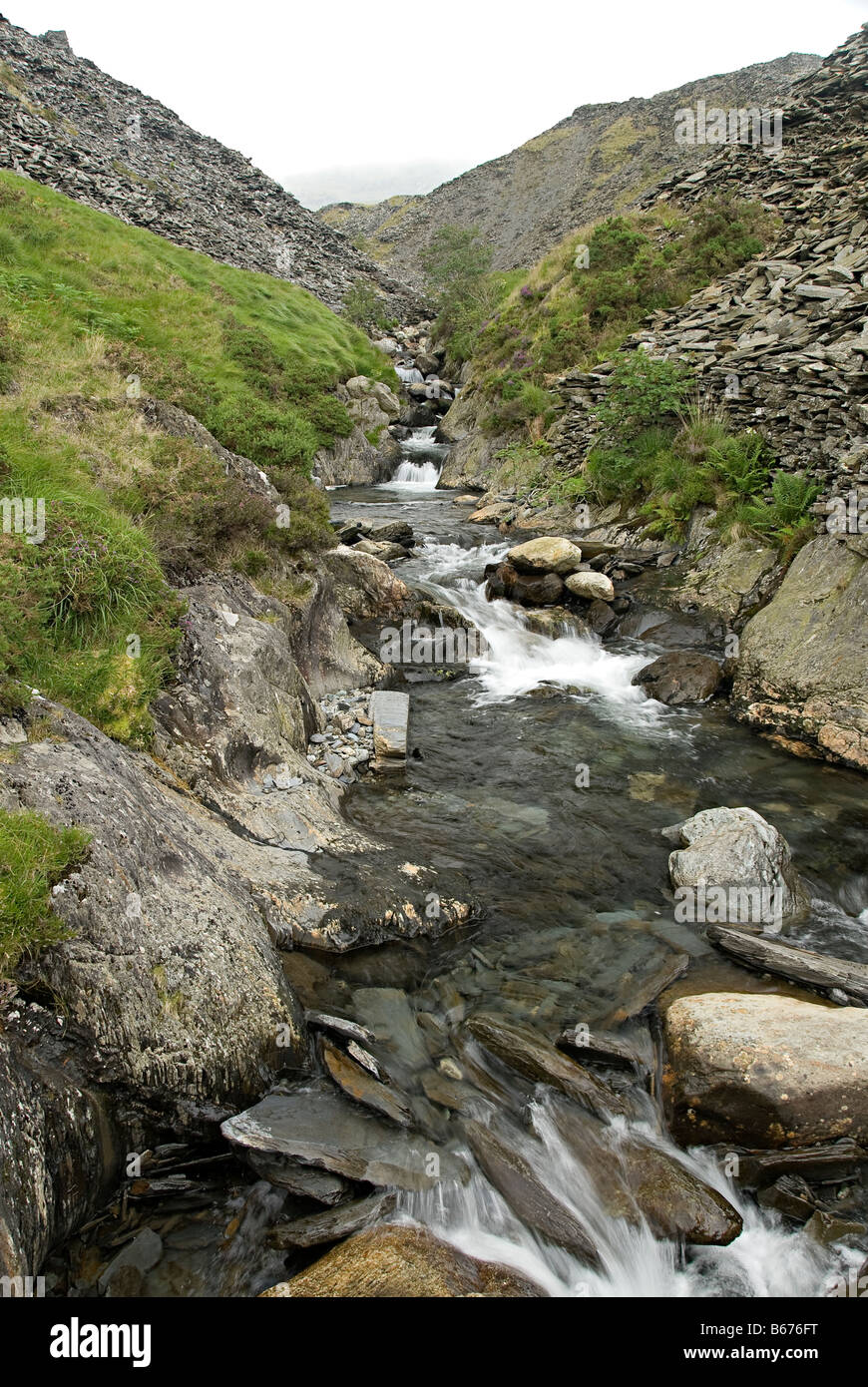 stream through slate mine on the mountainside from mining in snowdon ...