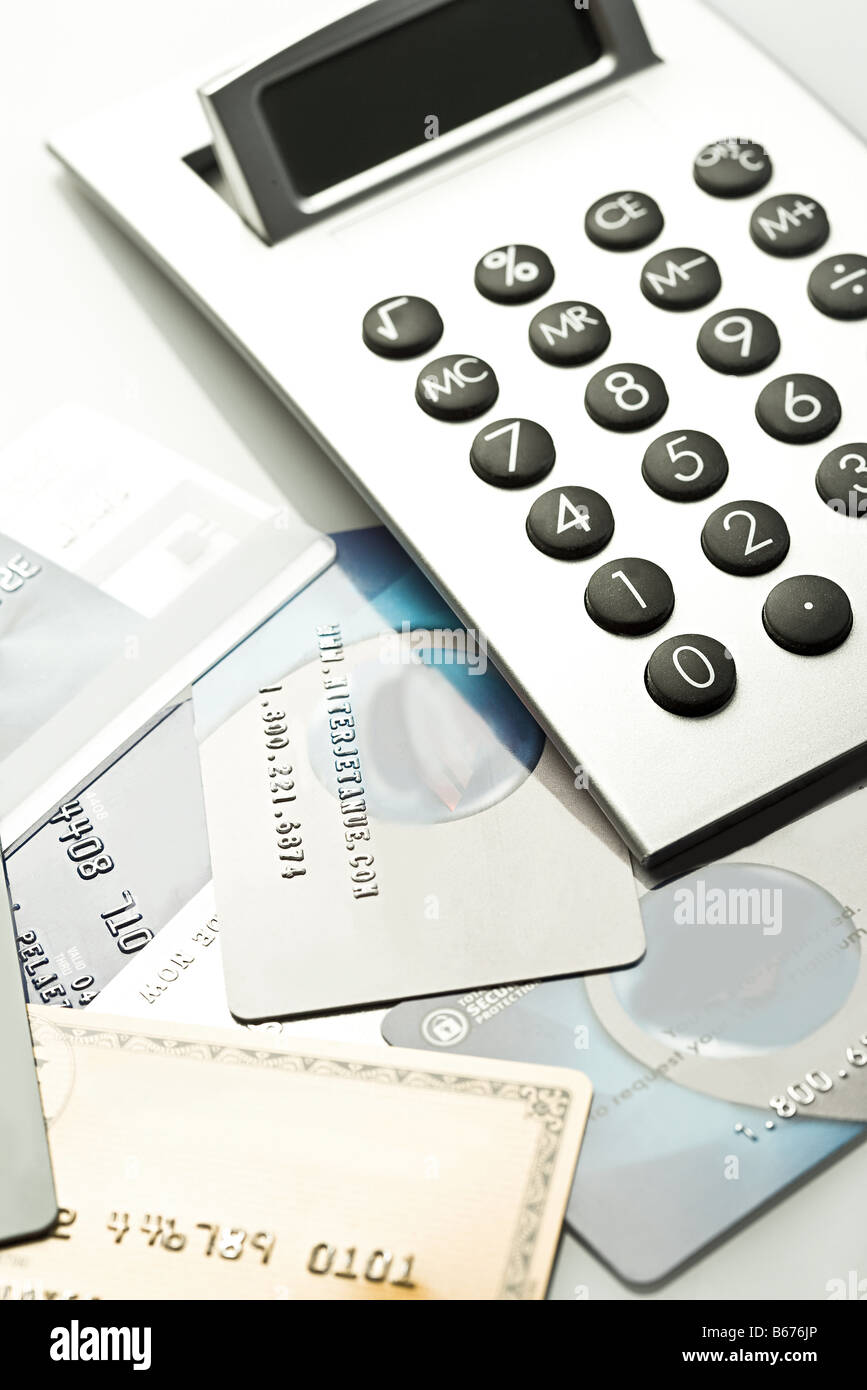 Credit cards and calculator Stock Photo - Alamy
