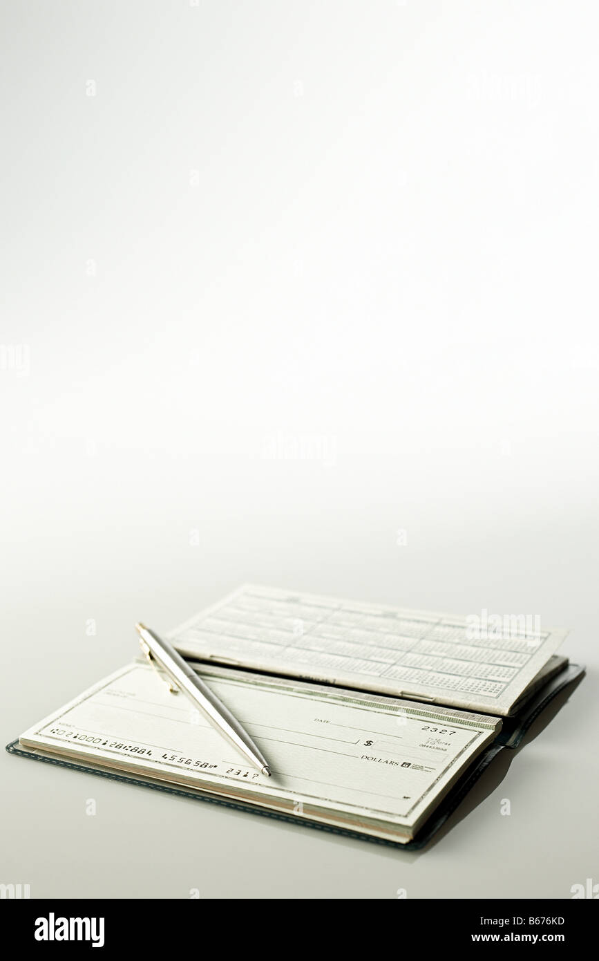 Cheque book pen hi-res stock photography and images - Alamy