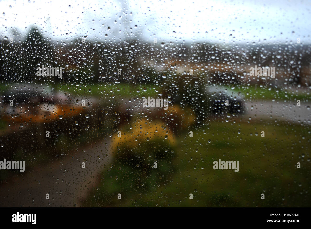 Rain on glass window in England on a gloomy winters day Stock Photo - Alamy