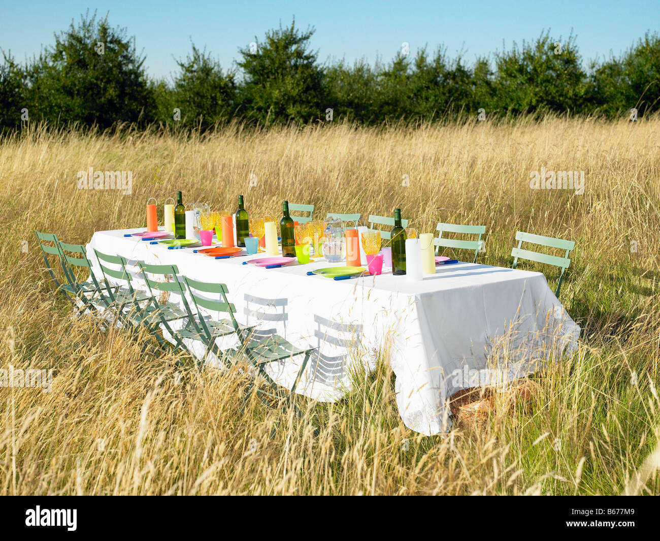 Table in a field, celebration Stock Photo - Alamy