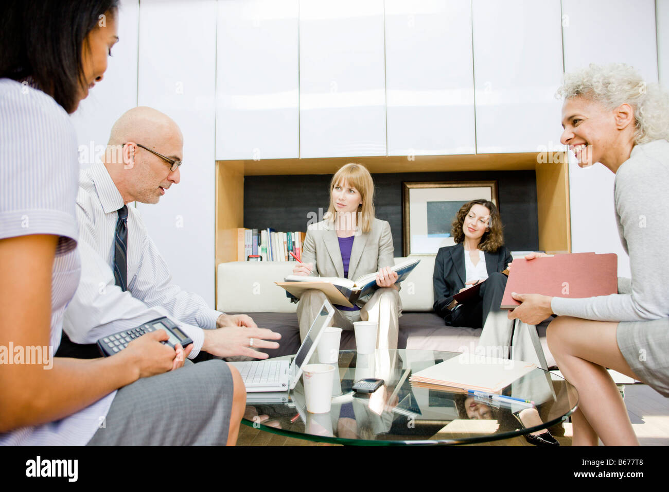 5 business people talking Stock Photo - Alamy