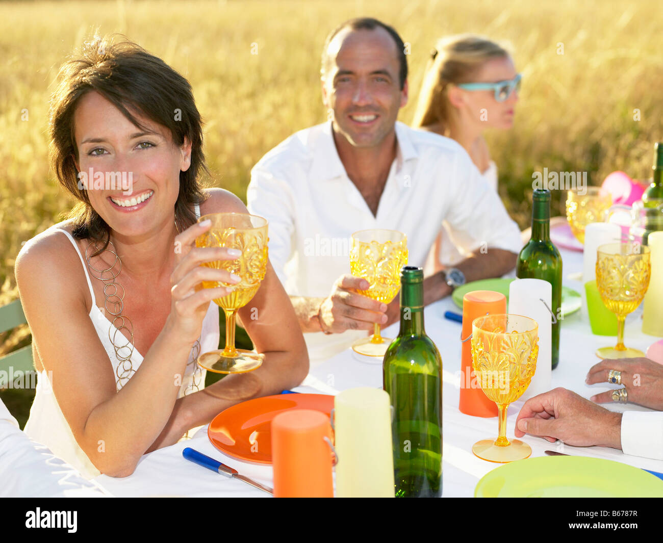People having dinner, woman portrait Stock Photo - Alamy