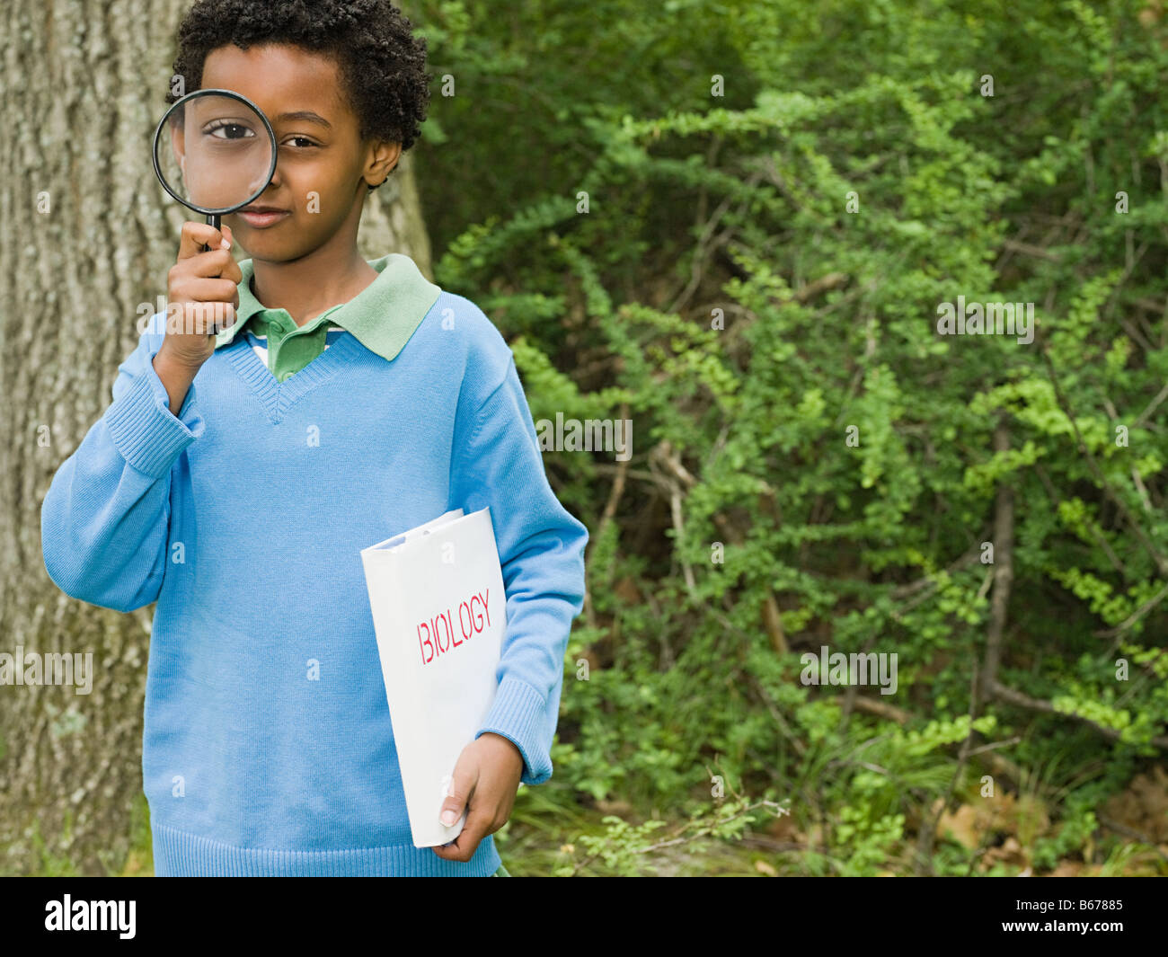 Magnifying glass book children hi-res stock photography and images - Alamy