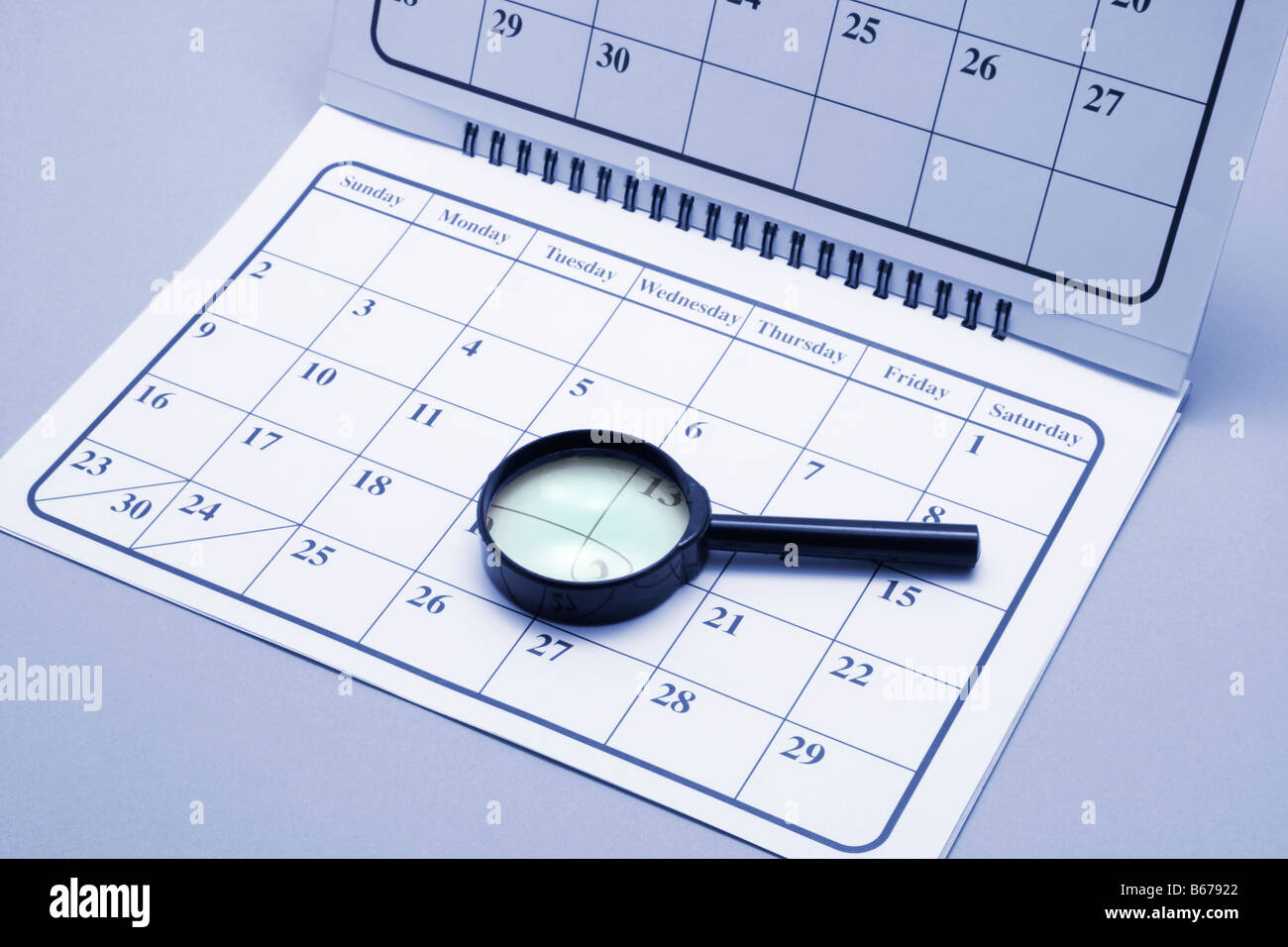 Magnifying Glass on Calendar Stock Photo - Alamy