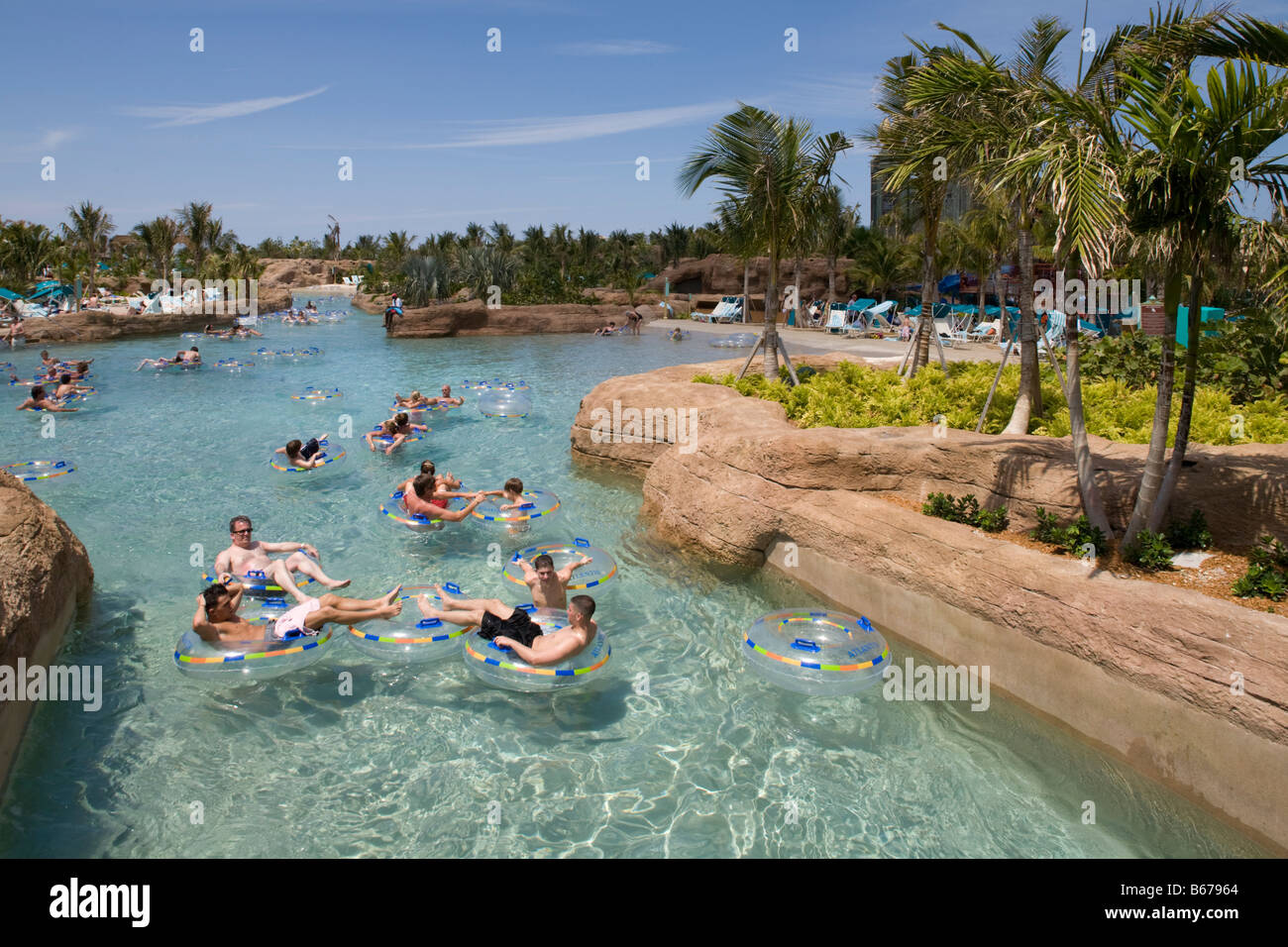 Bahamas Paradise Island Nassau Tourists float on water ride at Atlantis ...