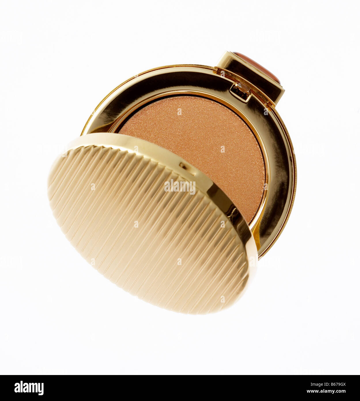 Cosmetic powder gold hi-res stock photography and images - Alamy