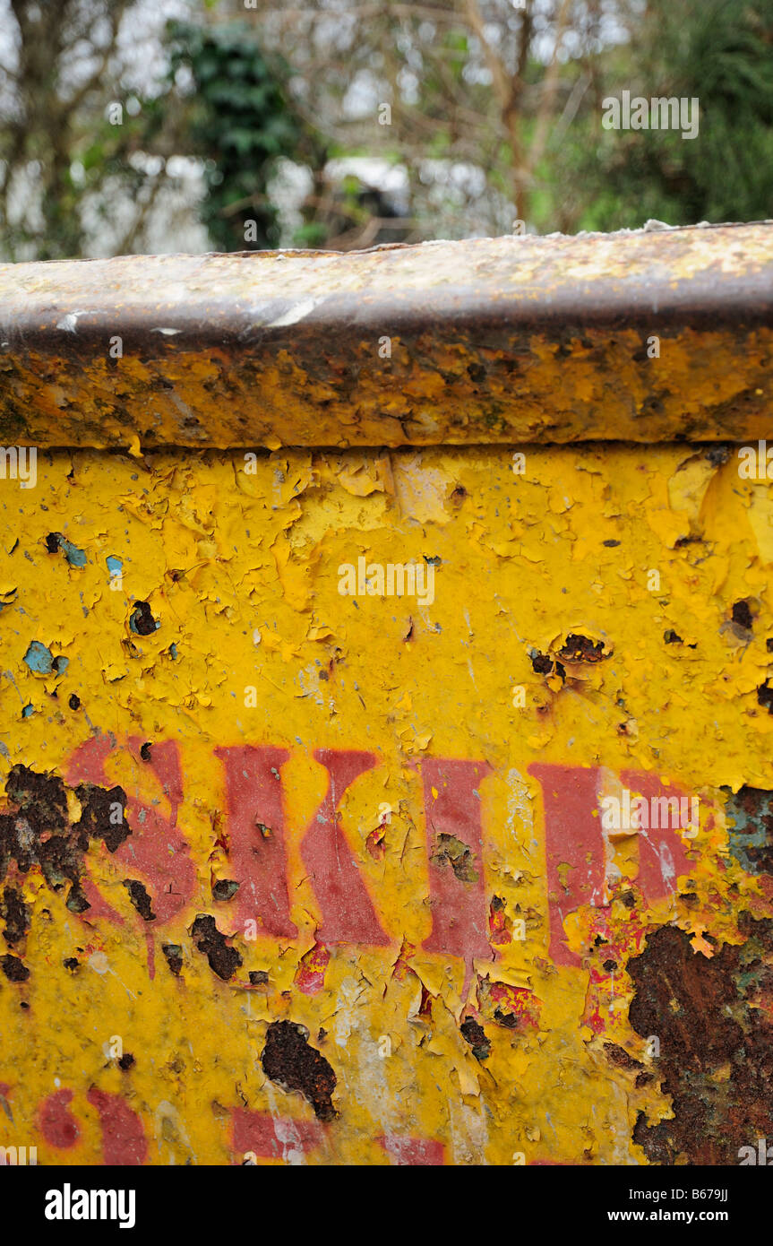 Side of a Yellow Builders Skip Stock Photo - Alamy