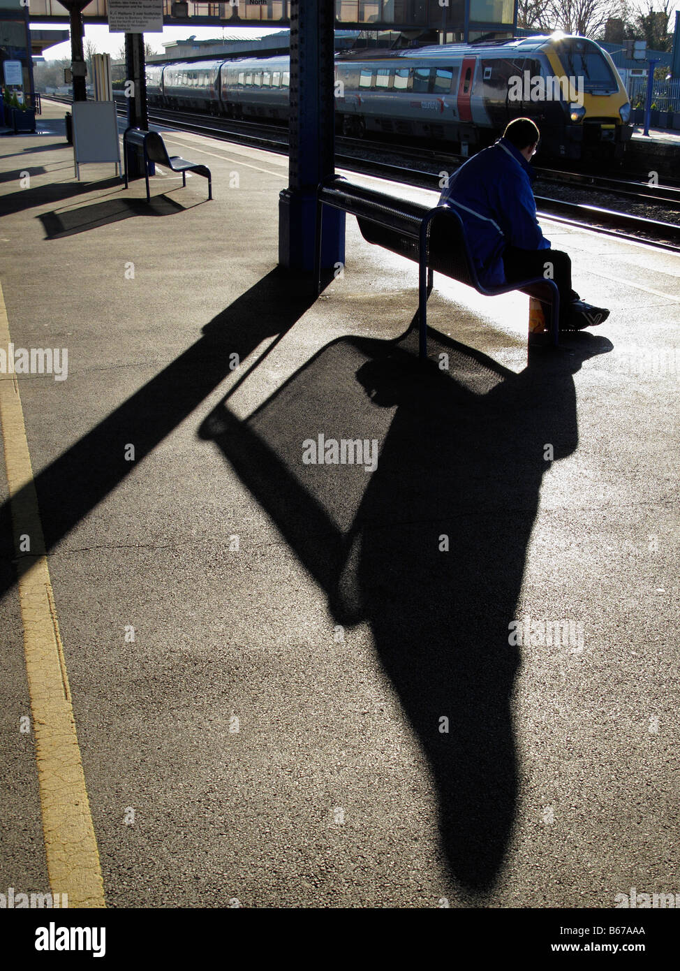 Man waiting for train, Oxford Station Stock Photo - Alamy