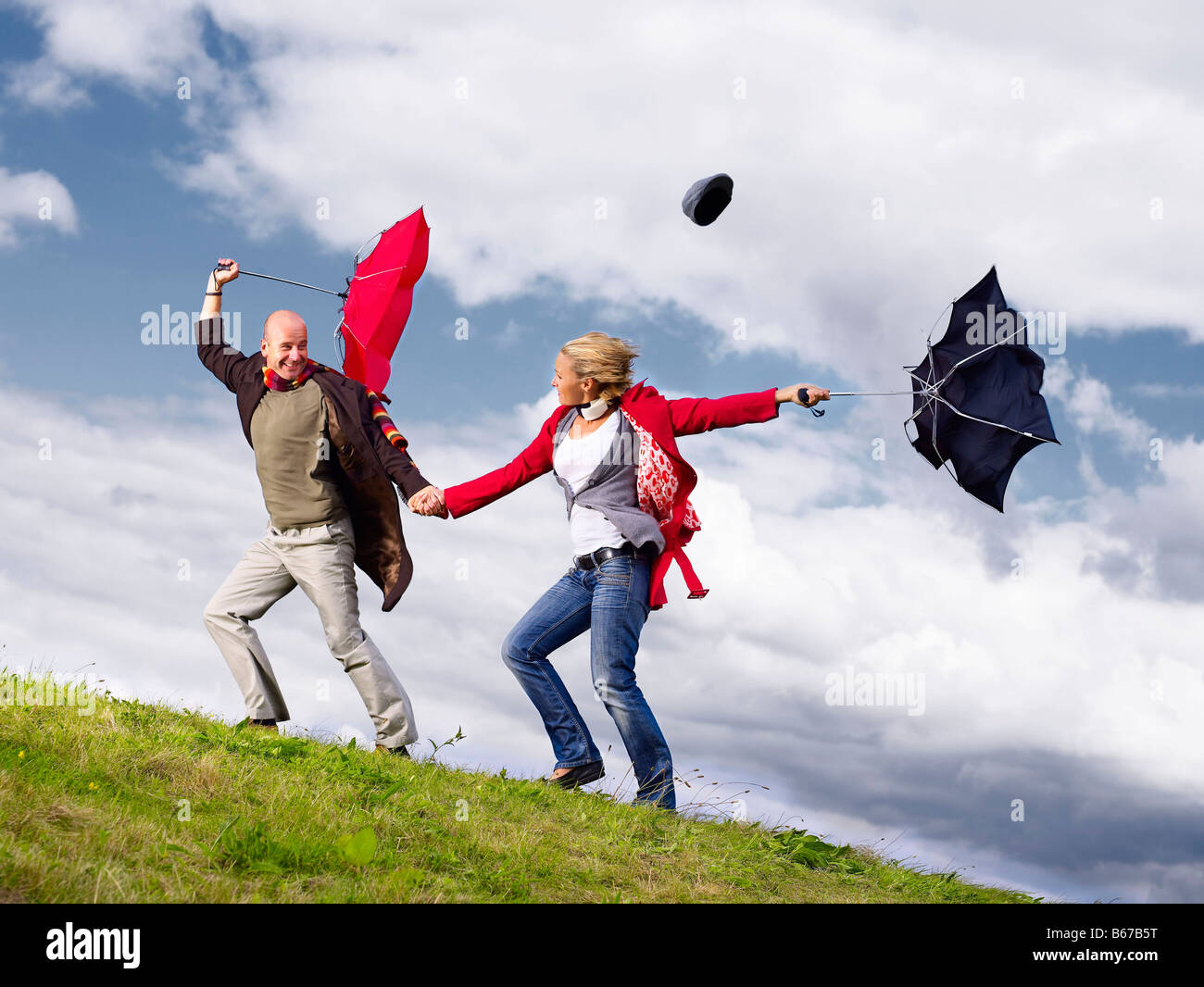 Difficulty walking in wind hi-res stock photography and images - Alamy