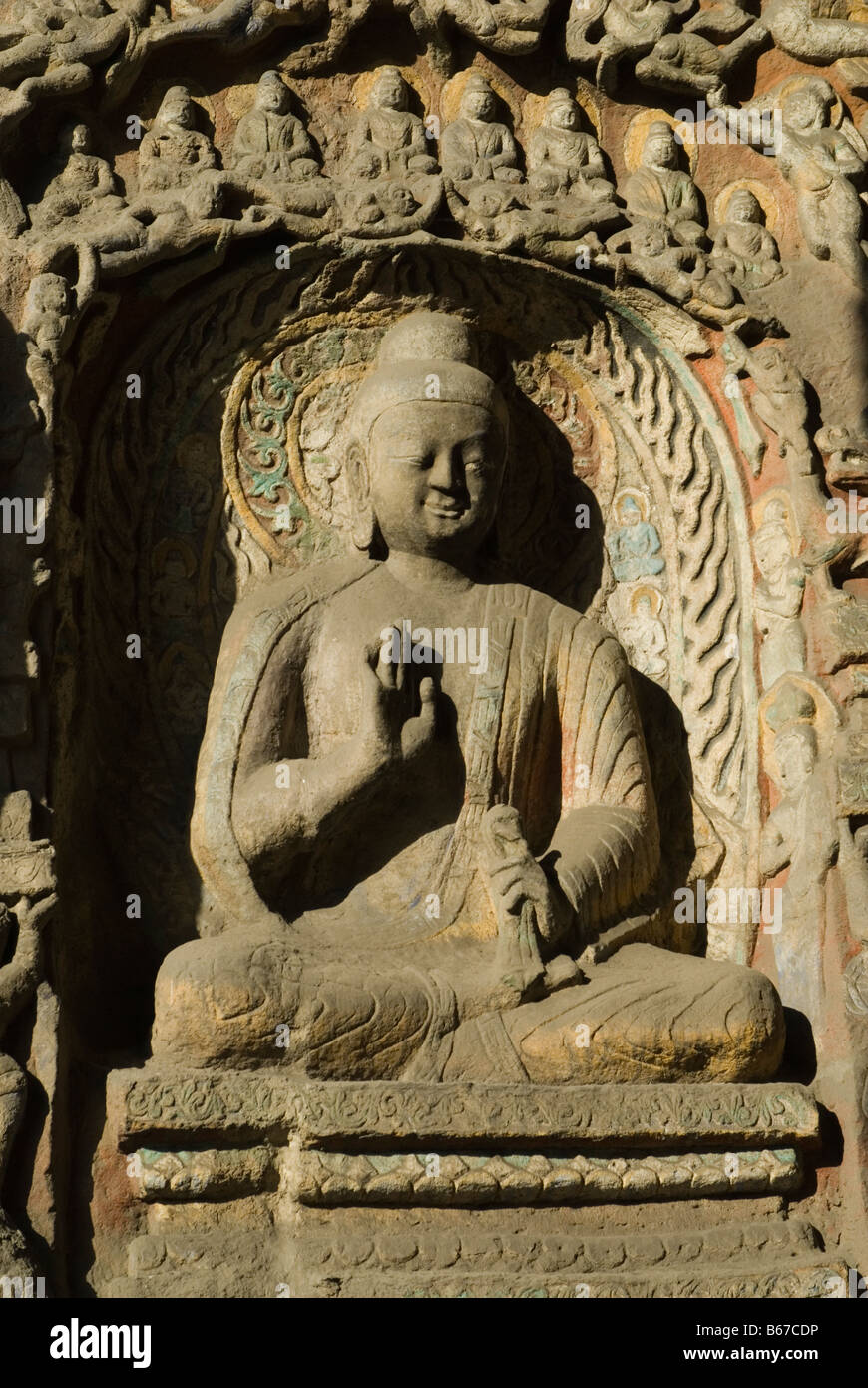 Buddha effigy at Yungang Grottoes, Datong, Shanxi , China Stock Photo ...