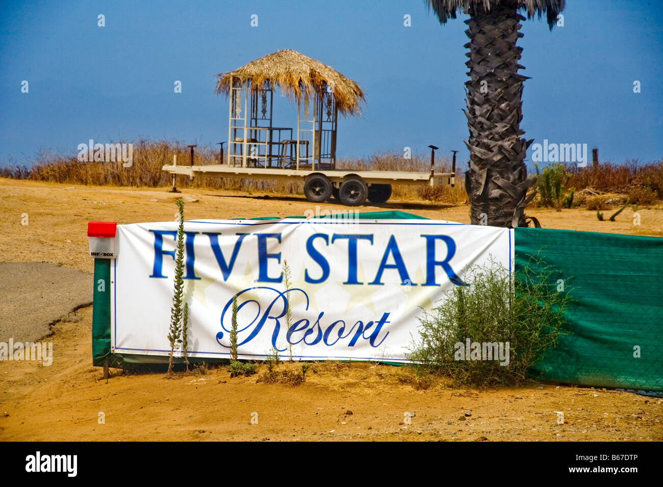Five Star Resort sign with tiny grass hut at building site in Leucadia ...