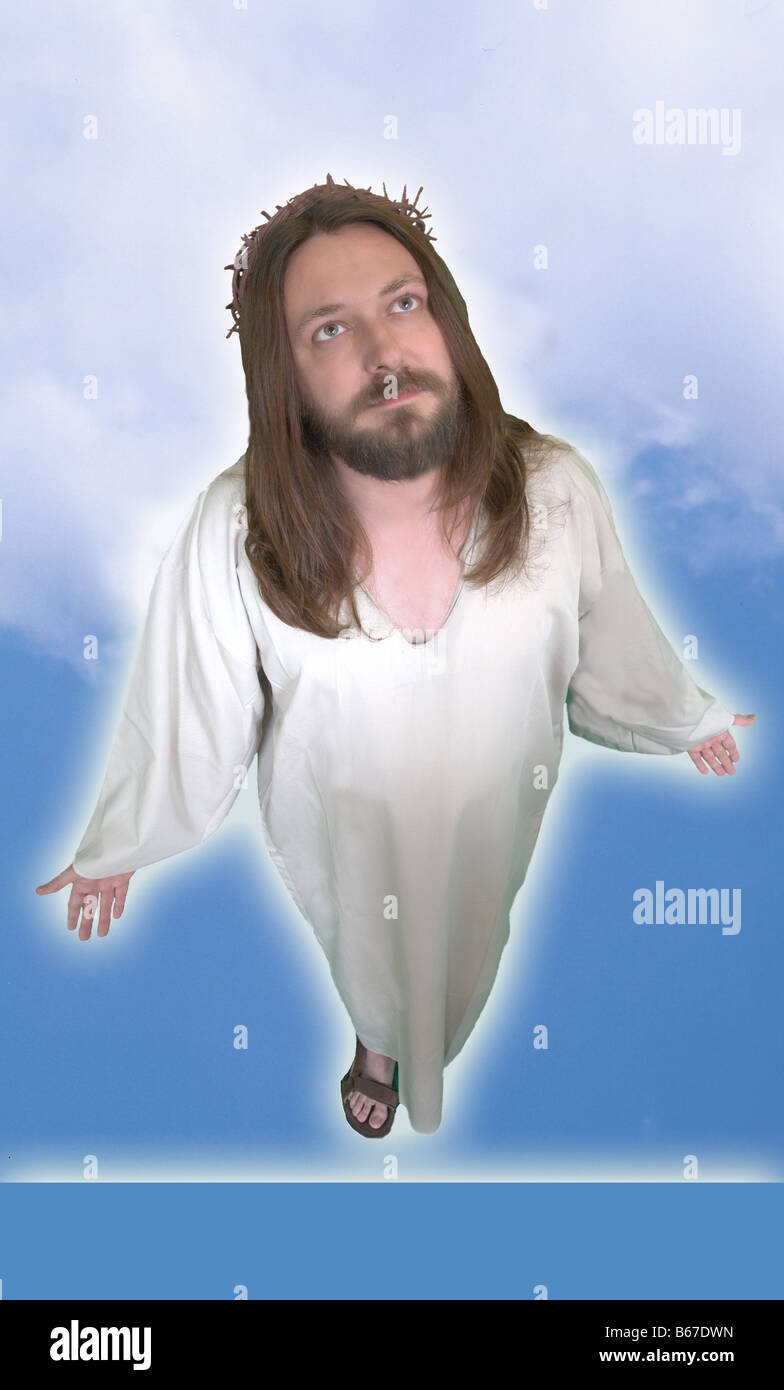 Jesus floating in the heavens and blue sky Stock Photo - Alamy
