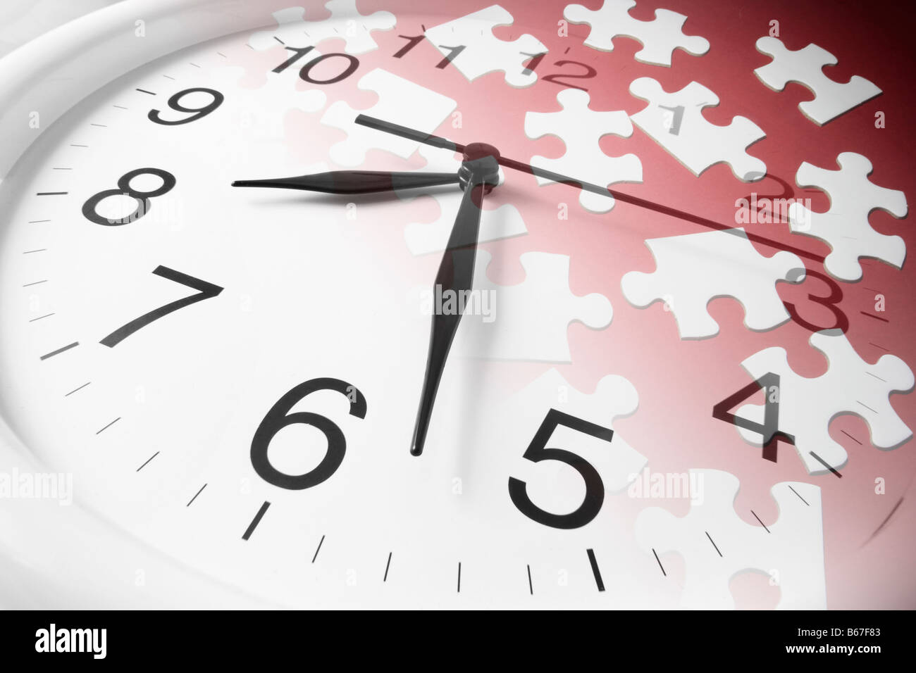 Jigsaw Puzzle Pieces and Clock Stock Photo - Alamy