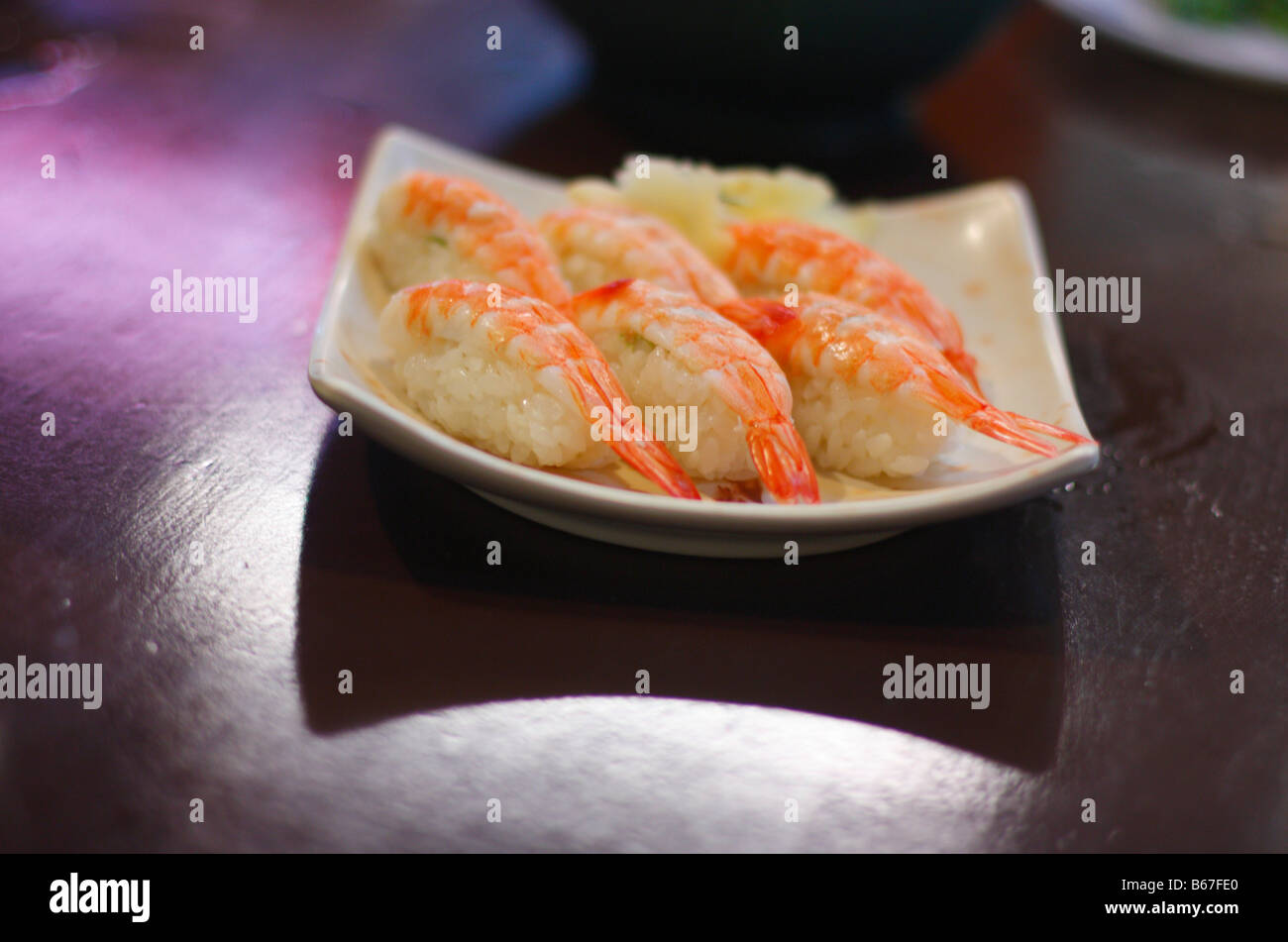 Shrimp sushi on a square plate Stock Photo - Alamy