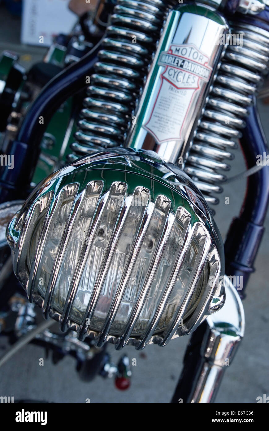 Retro style headlight with protection bars on a Harley Davidson ...