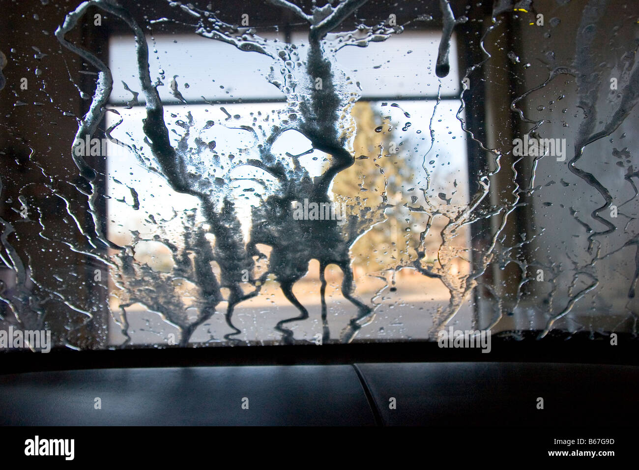 Soapy car windshield in car wash Stock Photo - Alamy