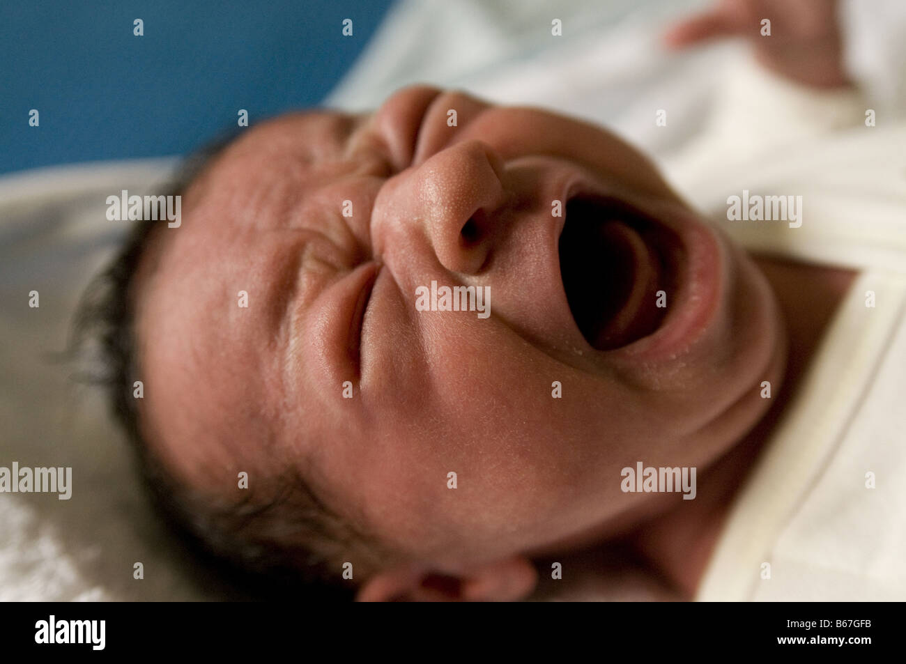 newborn baby screaming Stock Photo - Alamy