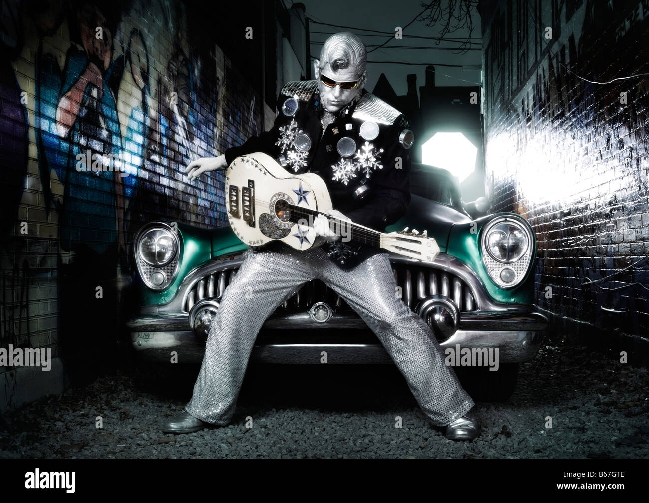 License available at MaximImages.com - Silver Elvis with a guitar and ...