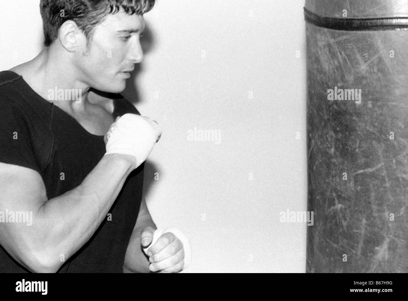 Boxing gloves punch man Black and White Stock Photos & Images - Alamy