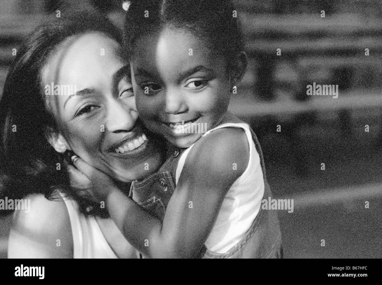 Mother child together indoors Black and White Stock Photos & Images - Alamy