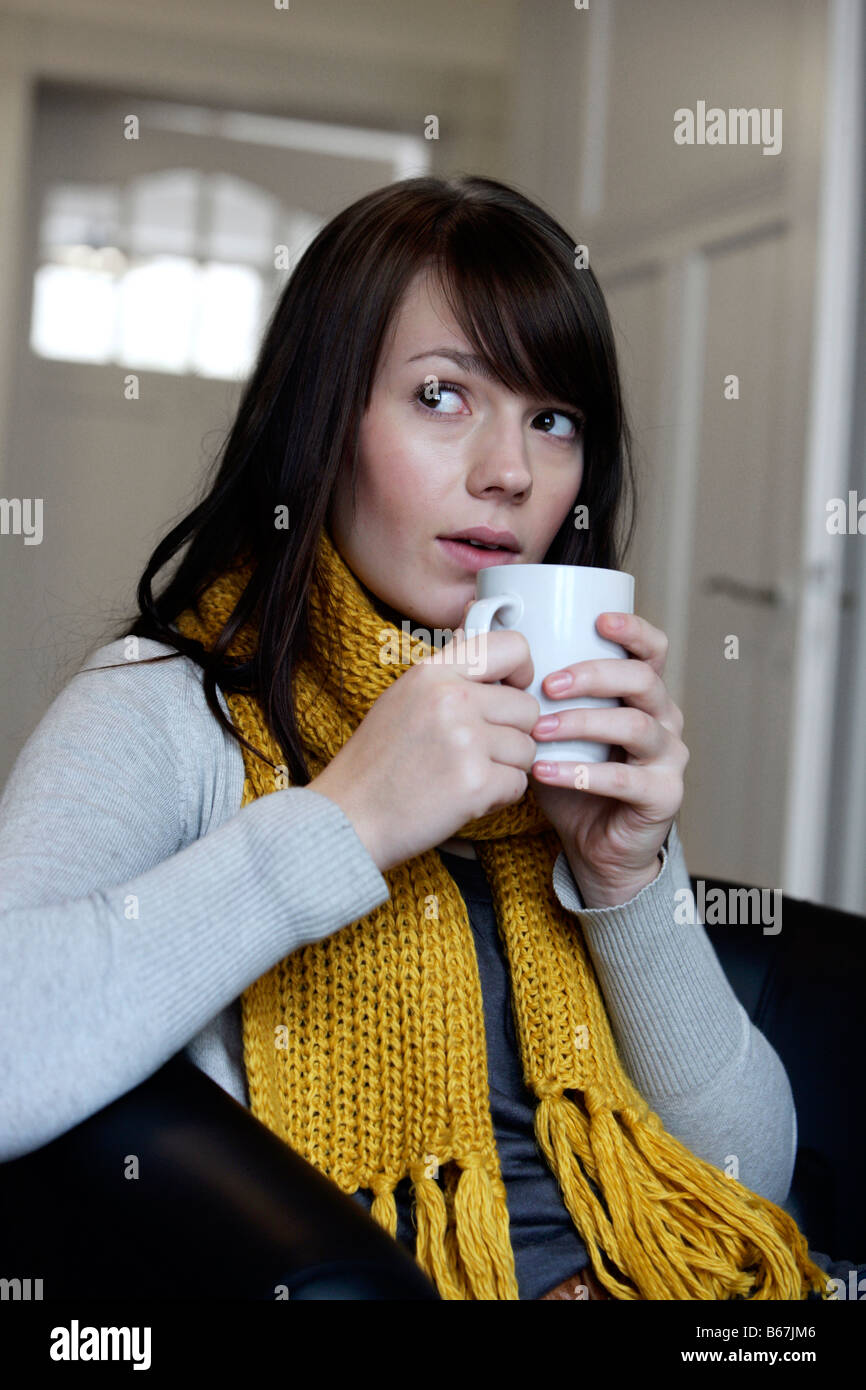Young Girl drinking Tea Stock Photo - Alamy