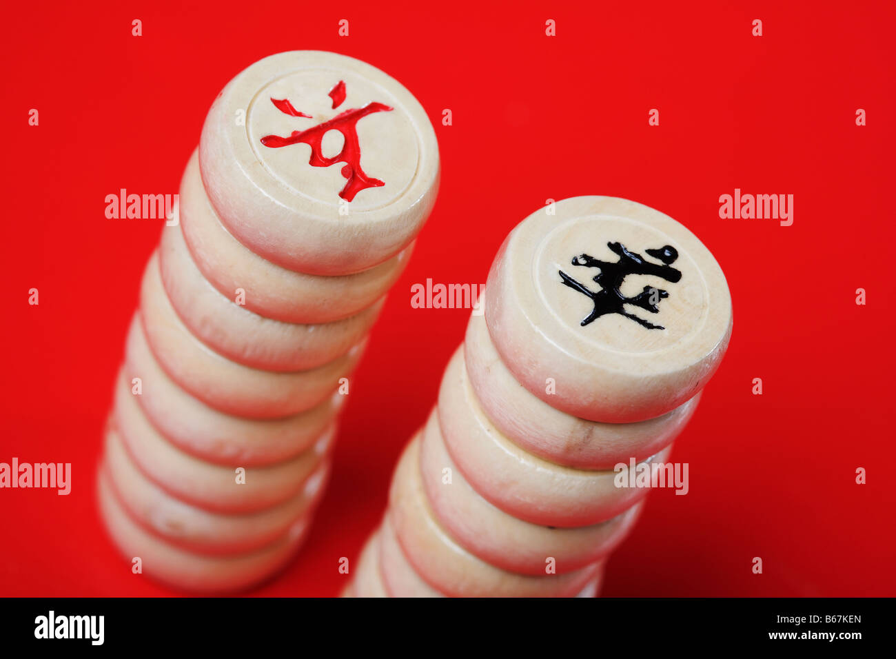 Close-up of stacks of Chinese chess pieces Stock Photo - Alamy
