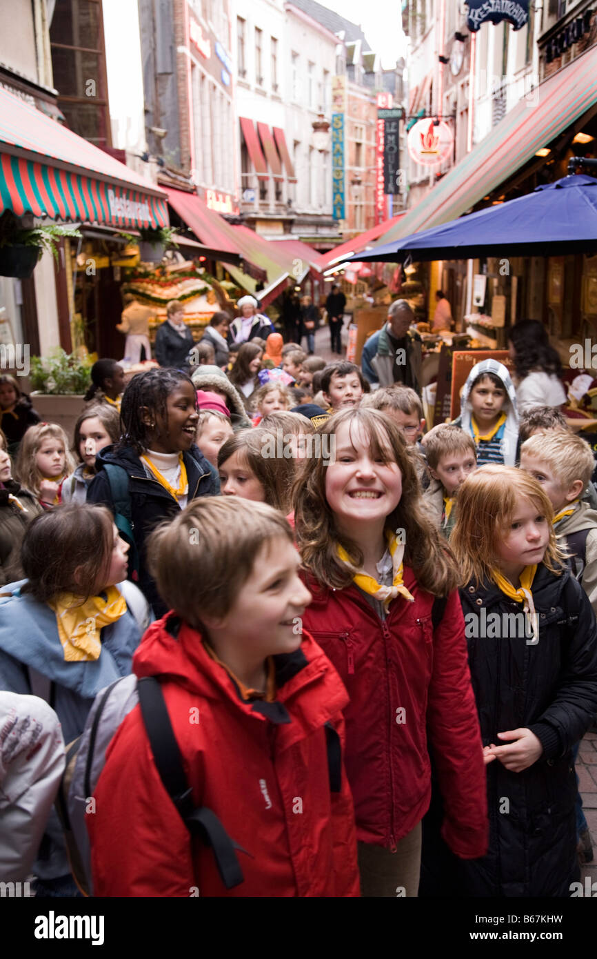 Group of school children in narrow streets near the Grand Place in ...