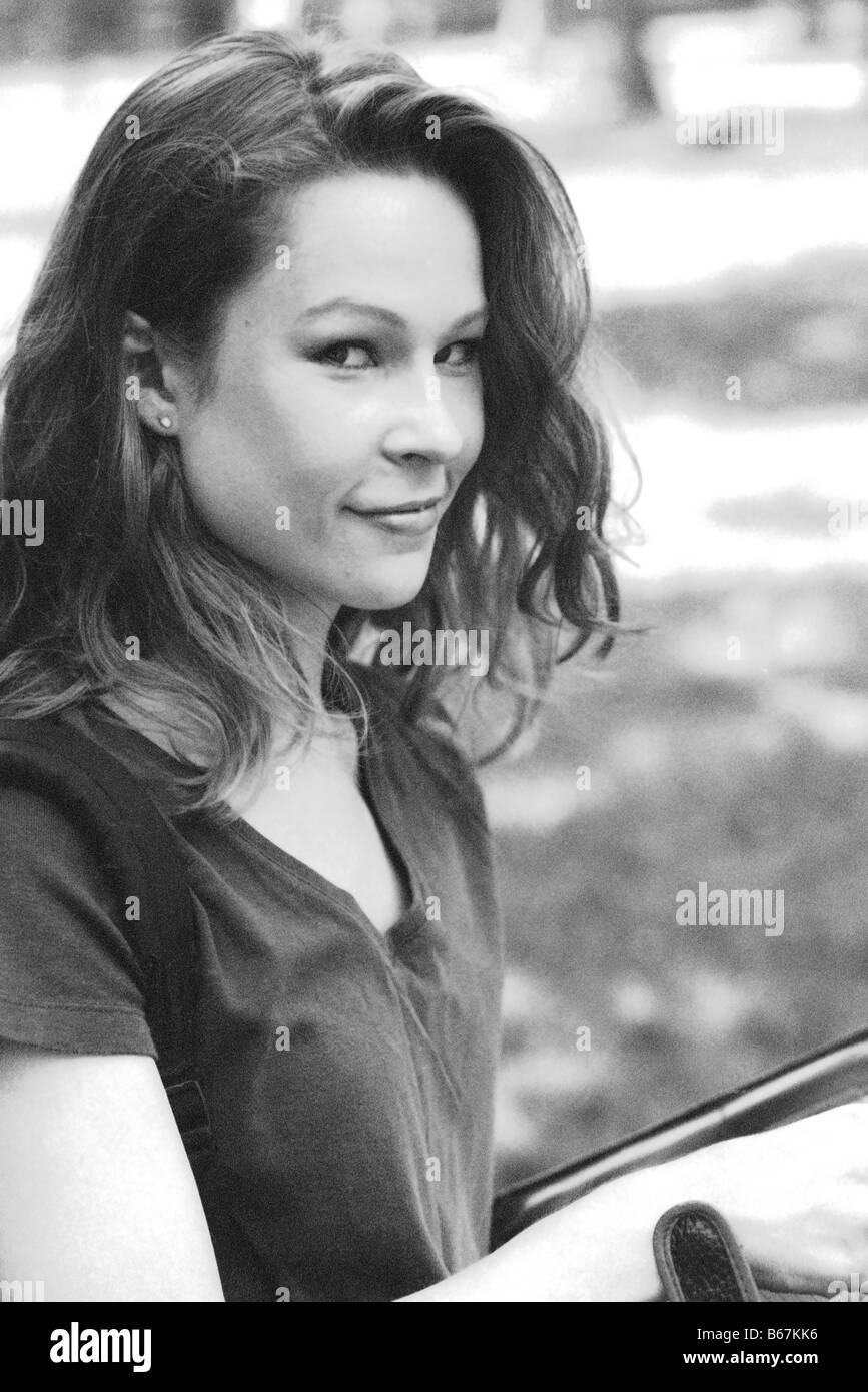 Young woman smiling, portrait Stock Photo - Alamy