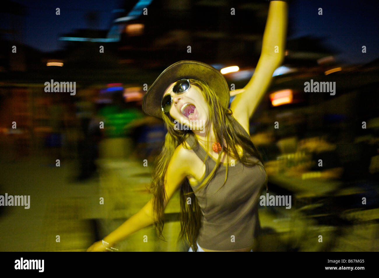A girl dancing at night Stock Photo - Alamy