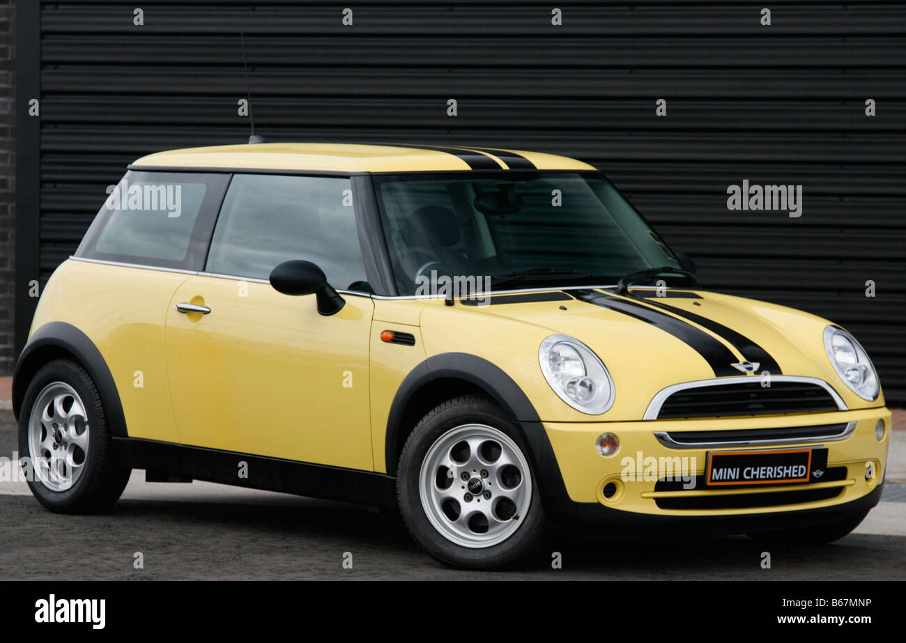 Yellow mini one with black strips Stock Photo - Alamy