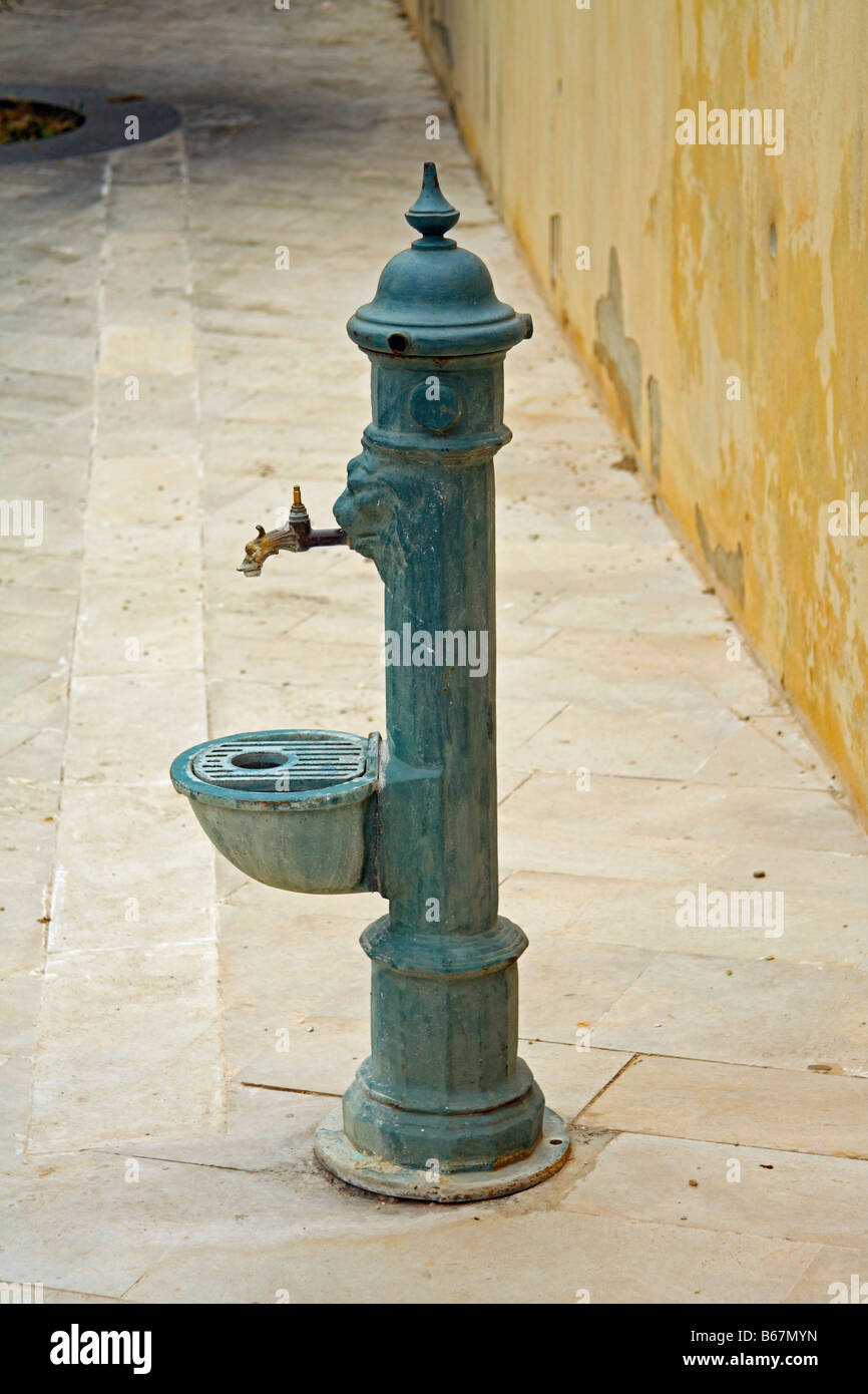 Communal water pump hi-res stock photography and images - Alamy