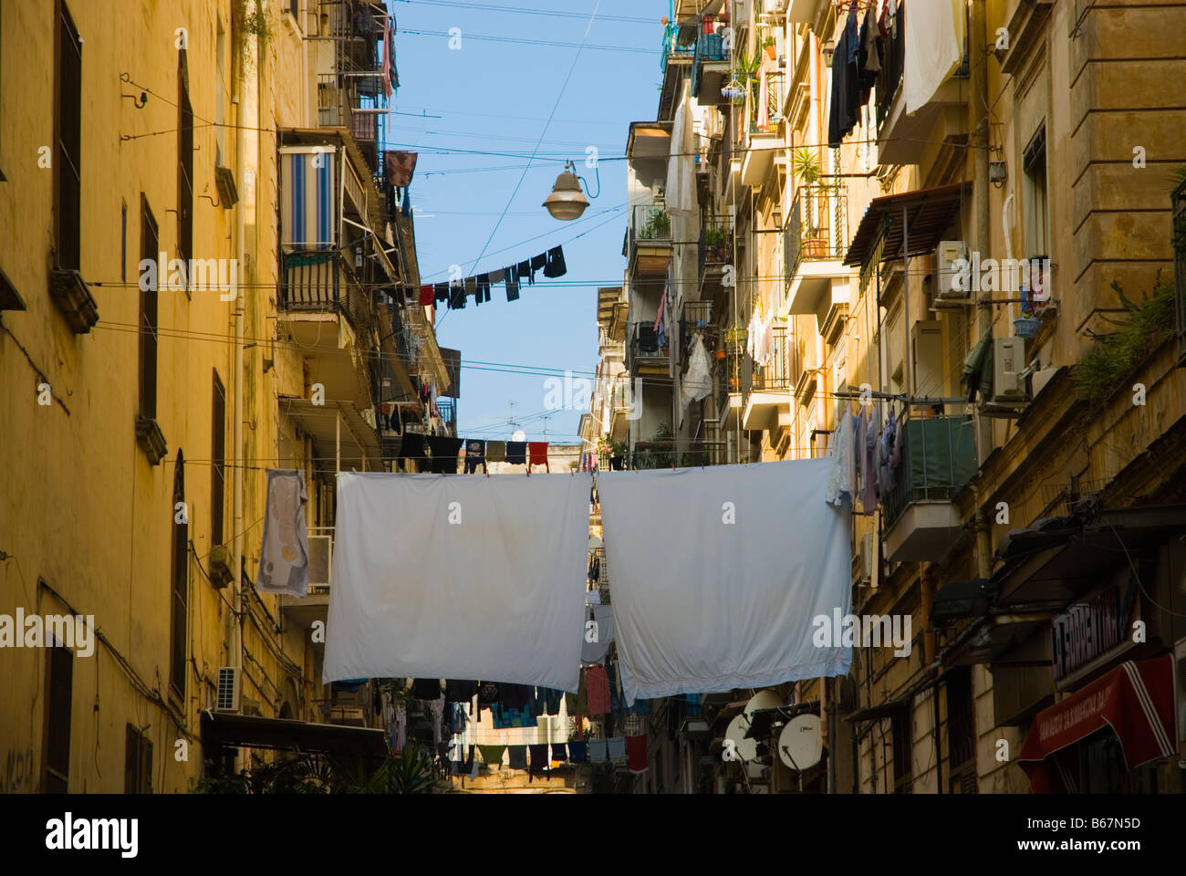 Laundry hanging on street in centro storico quarter of Naples Italy ...
