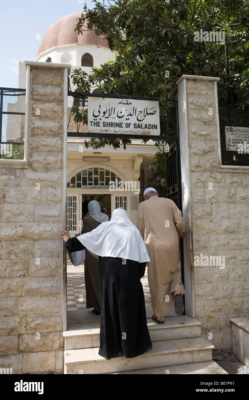Women and man entering The Shrine of Saladin Mausoleum, Damascus, Syria ...