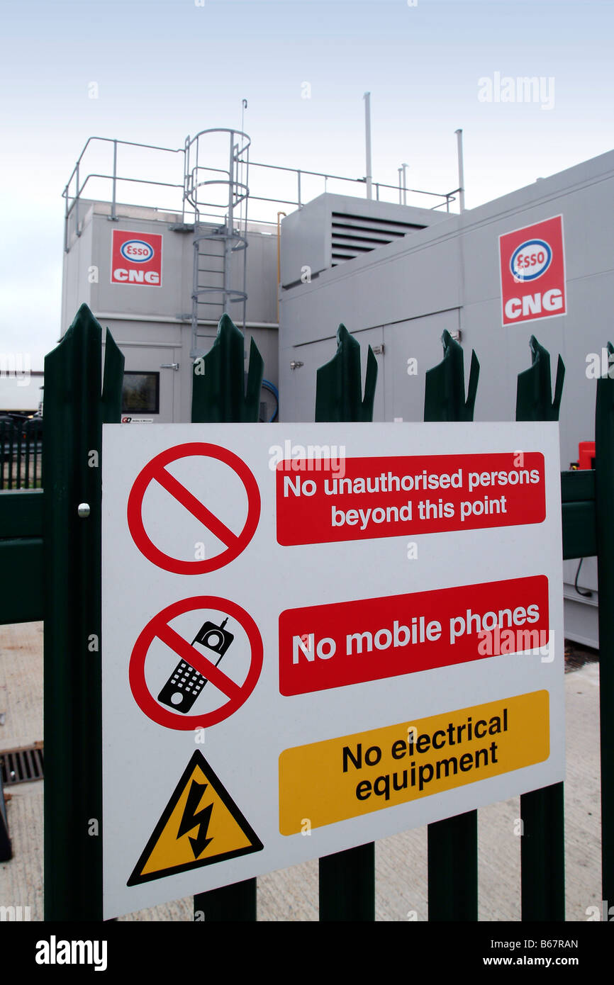 Warning signs on CNG refuelling plant Stock Photo - Alamy