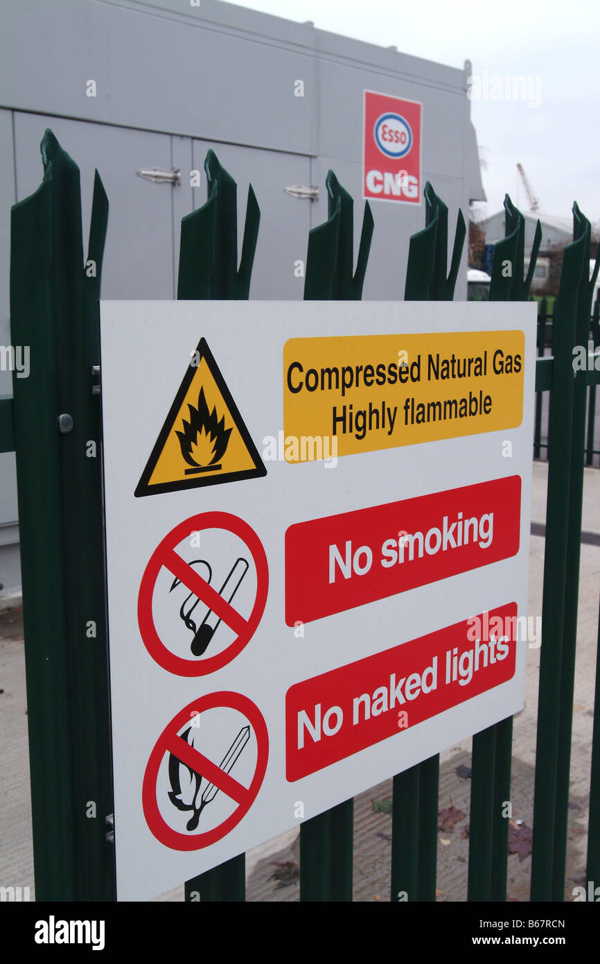 Warning signs on CNG refuelling plant Stock Photo - Alamy