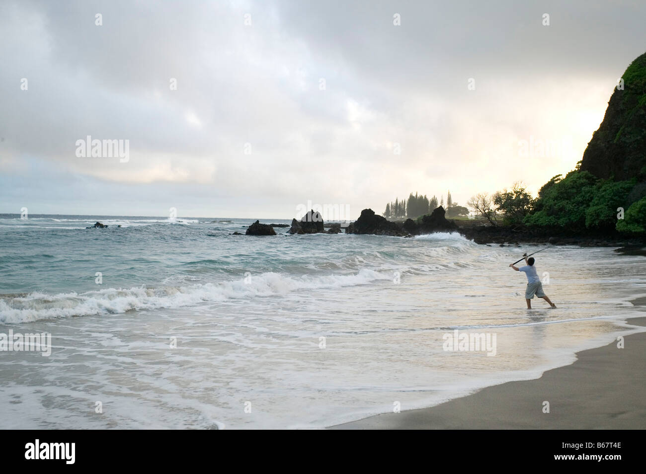USA, Hawaii, Maui, Hana, Hamoa Beach, fishing, angler, fisherman, ocean ...